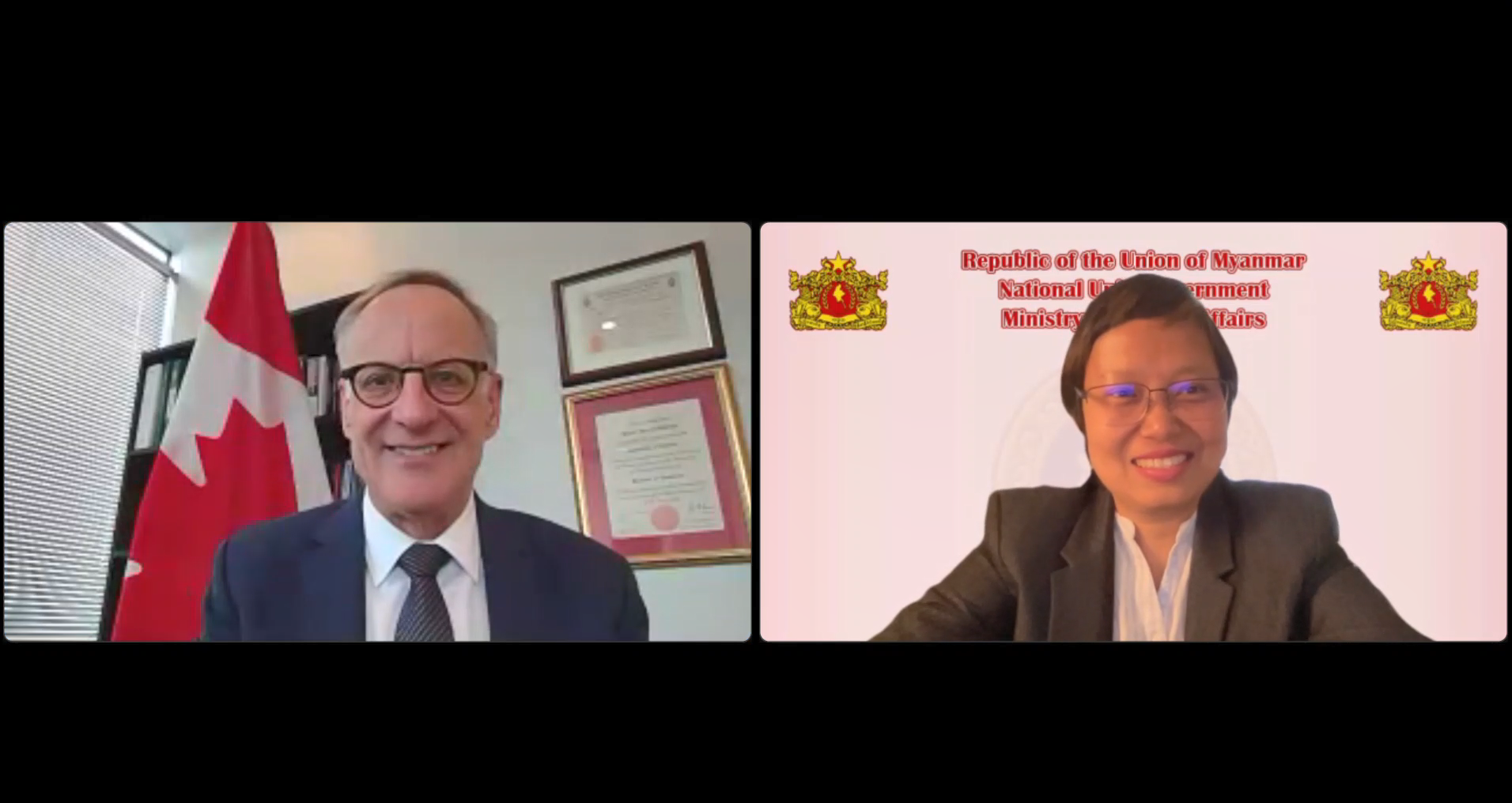 Parliamentary Secretary Oliphant speaks with representative of National ...